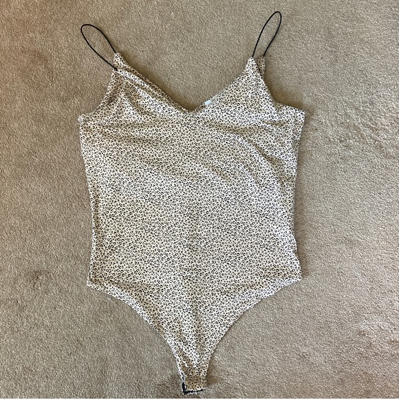Tops | Animal Print Bodysuit | Poshmark